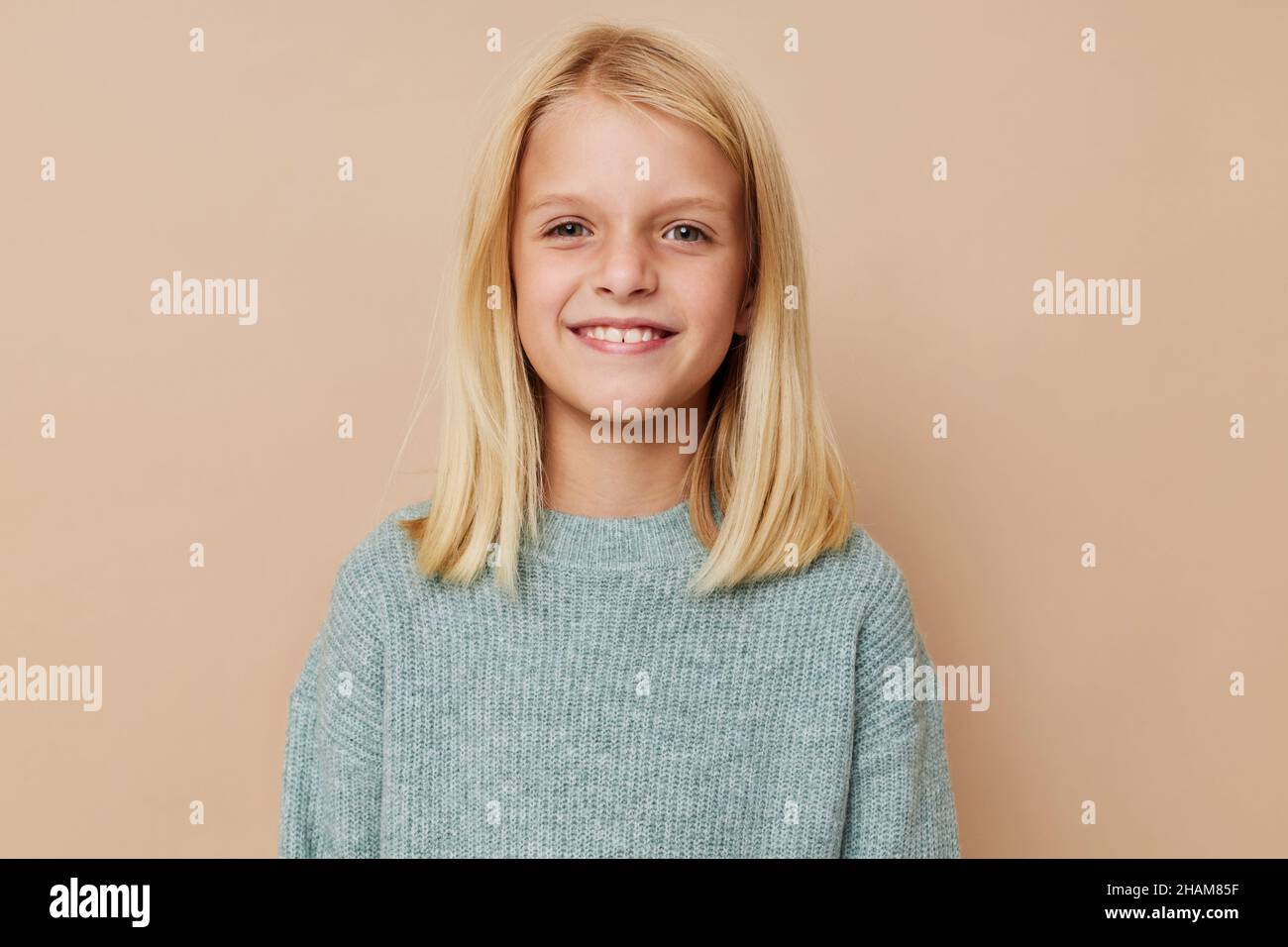 Portrait of a smiling little cutie with blond hair cropped view Stock ...