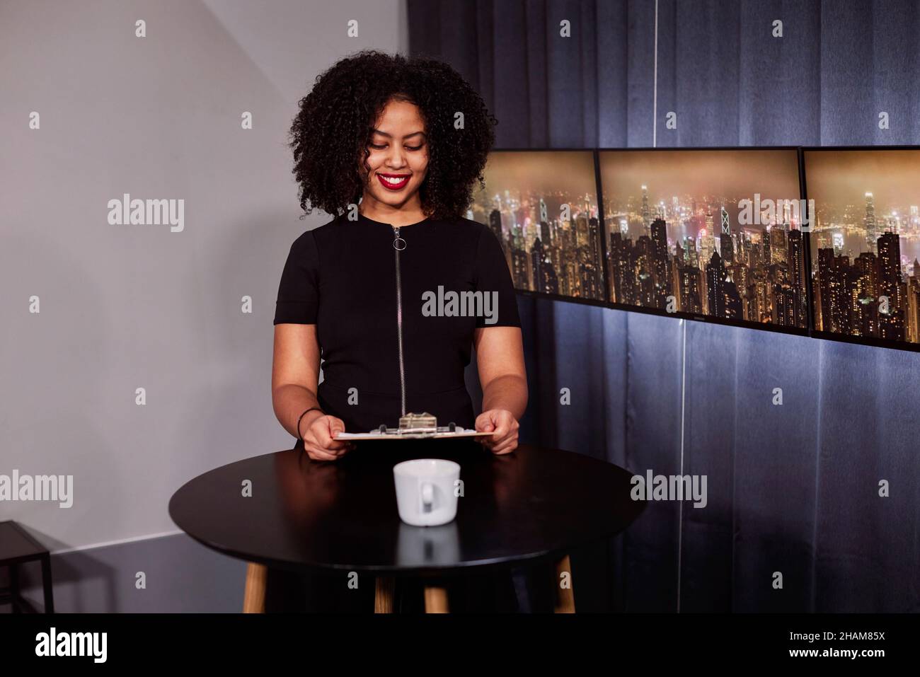 Female news anchor reporting news in studio Stock Photo - Alamy