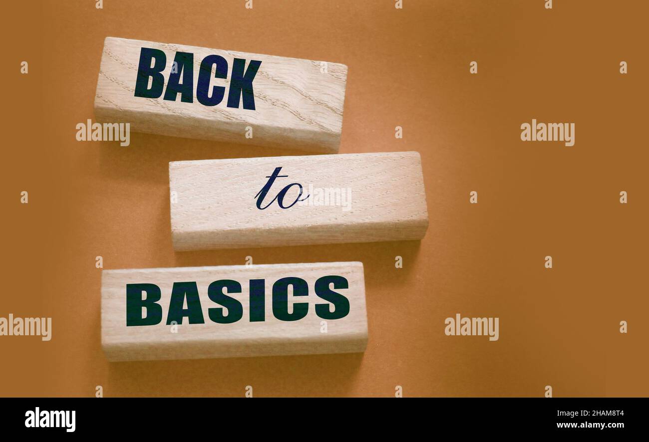 The words back to basics made of letters on wooden blocks. back to ...