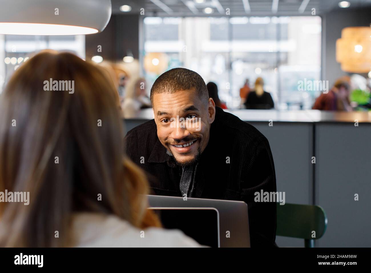 Man talking in the office Stock Photo - Alamy