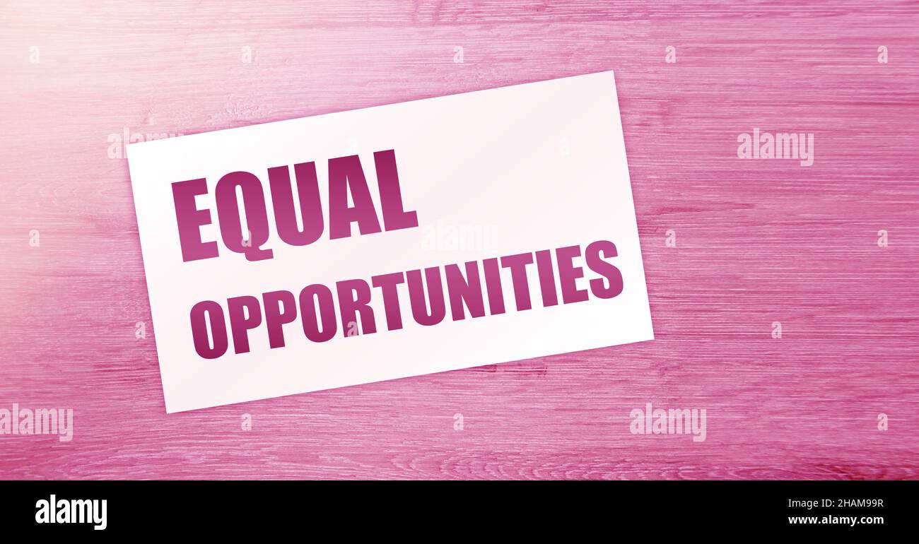 Equal opportunities words on card on wooden table. Business concept ...
