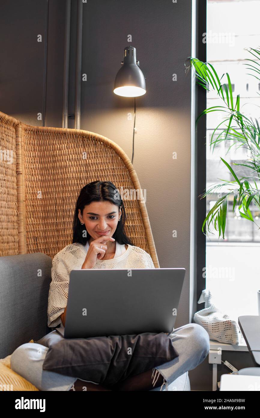 Young people using laptop coworking hi-res stock photography and images ...
