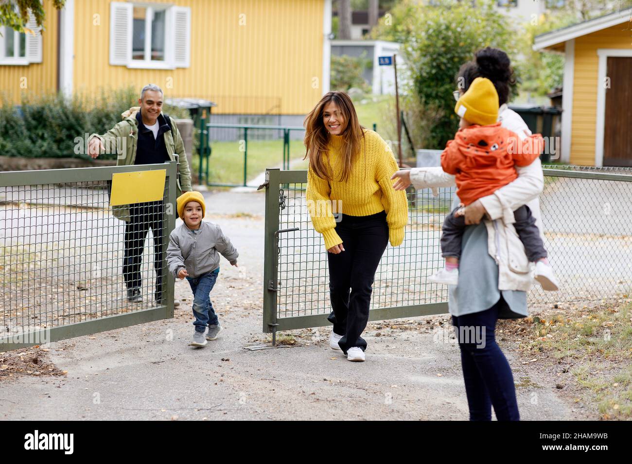 Family meeting each other outside Stock Photo - Alamy