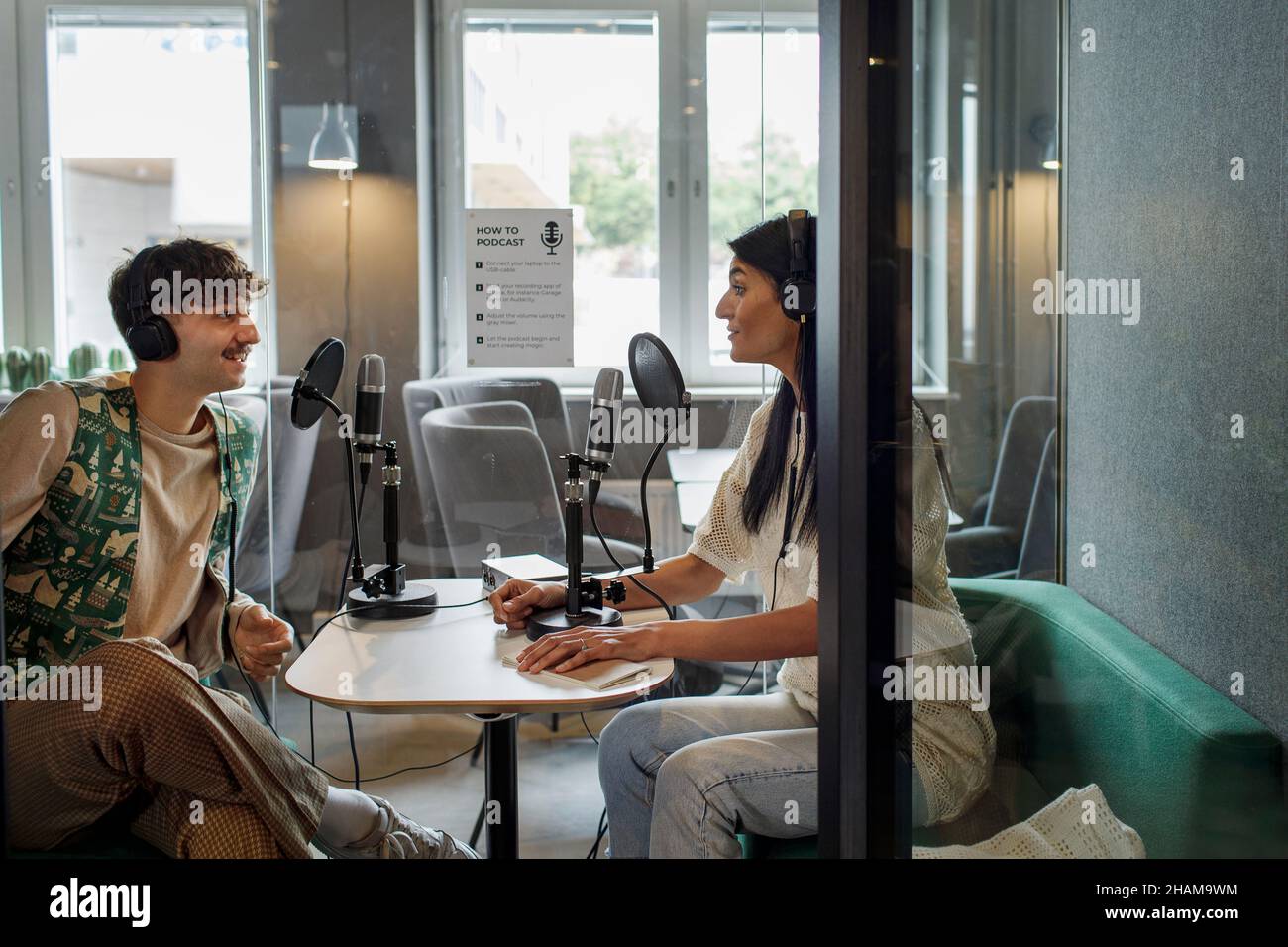 Man interview microphone woman hi-res stock photography and images - Alamy