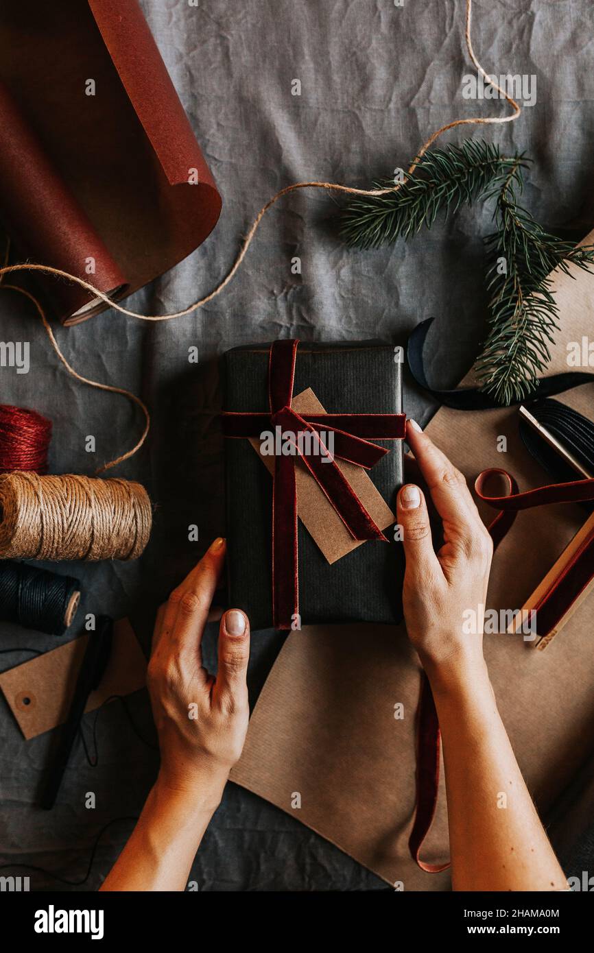 Womans hand holding present hi-res stock photography and images - Alamy