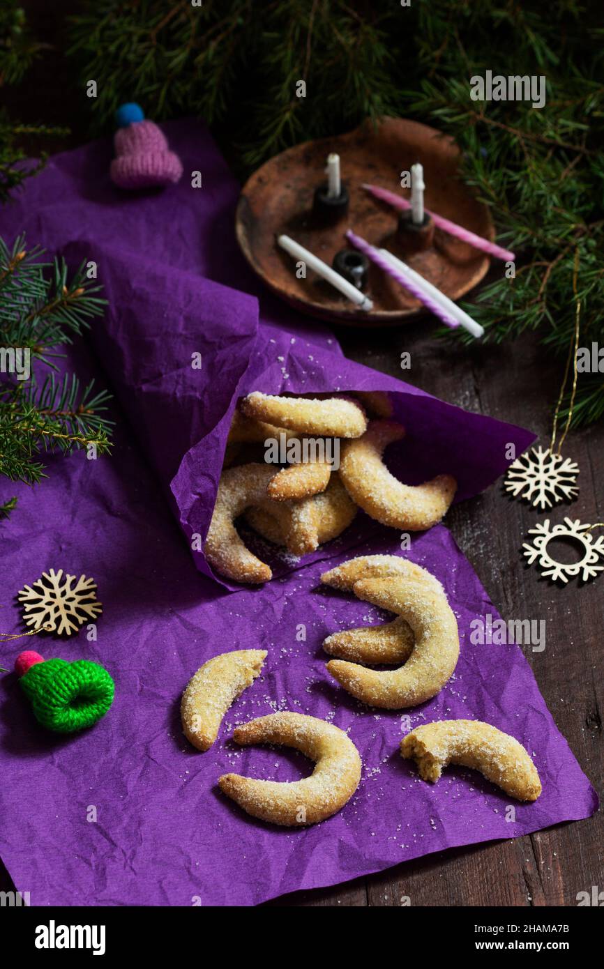 Traditional advent cookies vanilla crescents on a purple background ...
