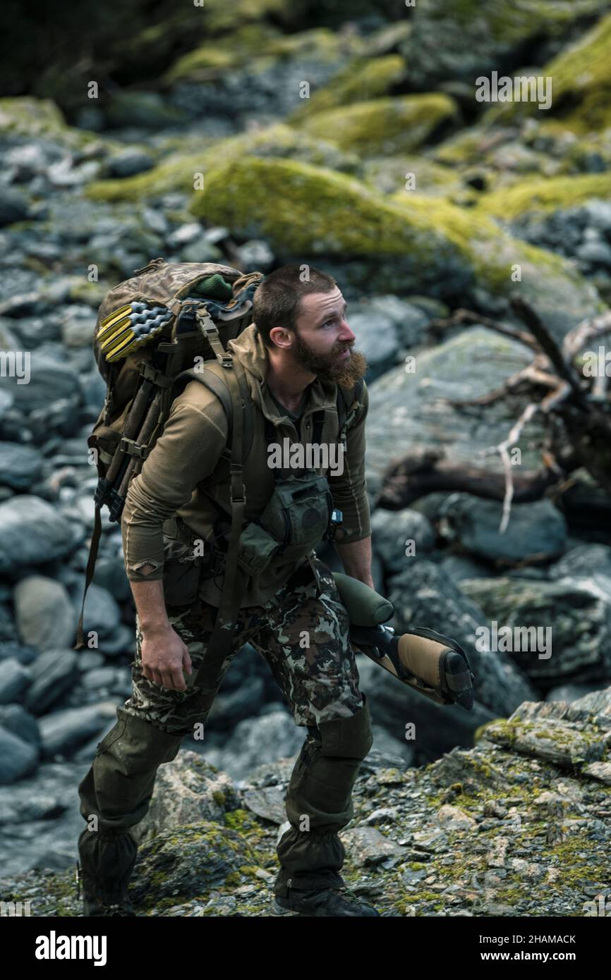 View of hunter hiking Stock Photo - Alamy