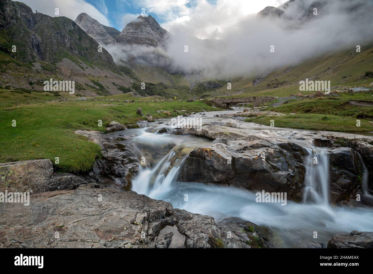 Cascades of the waterfall flowing from the ice circus in the French ...