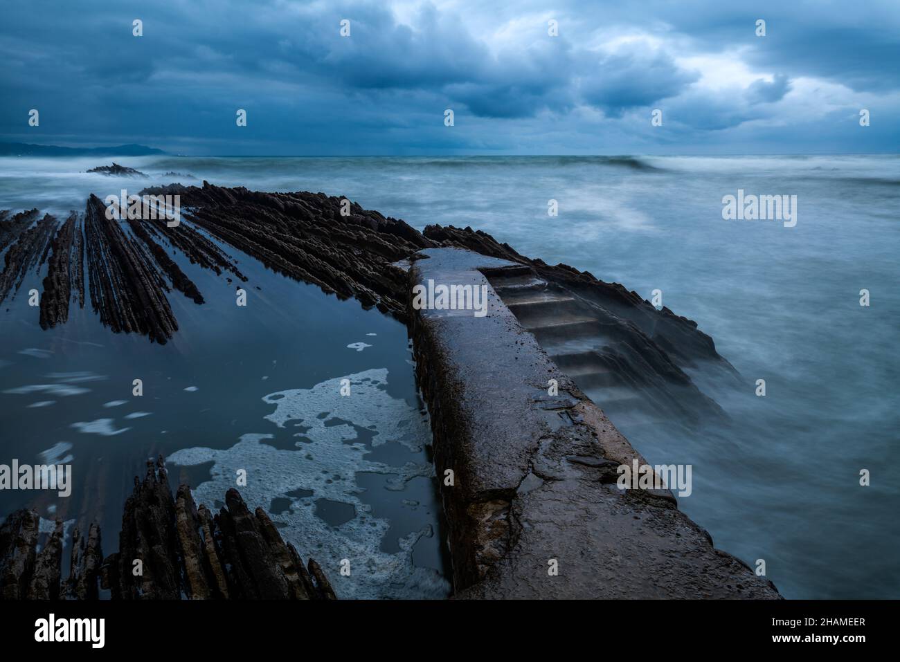 Itzurun Beach in Zumaia with the famous flysch coast in the Basque ...