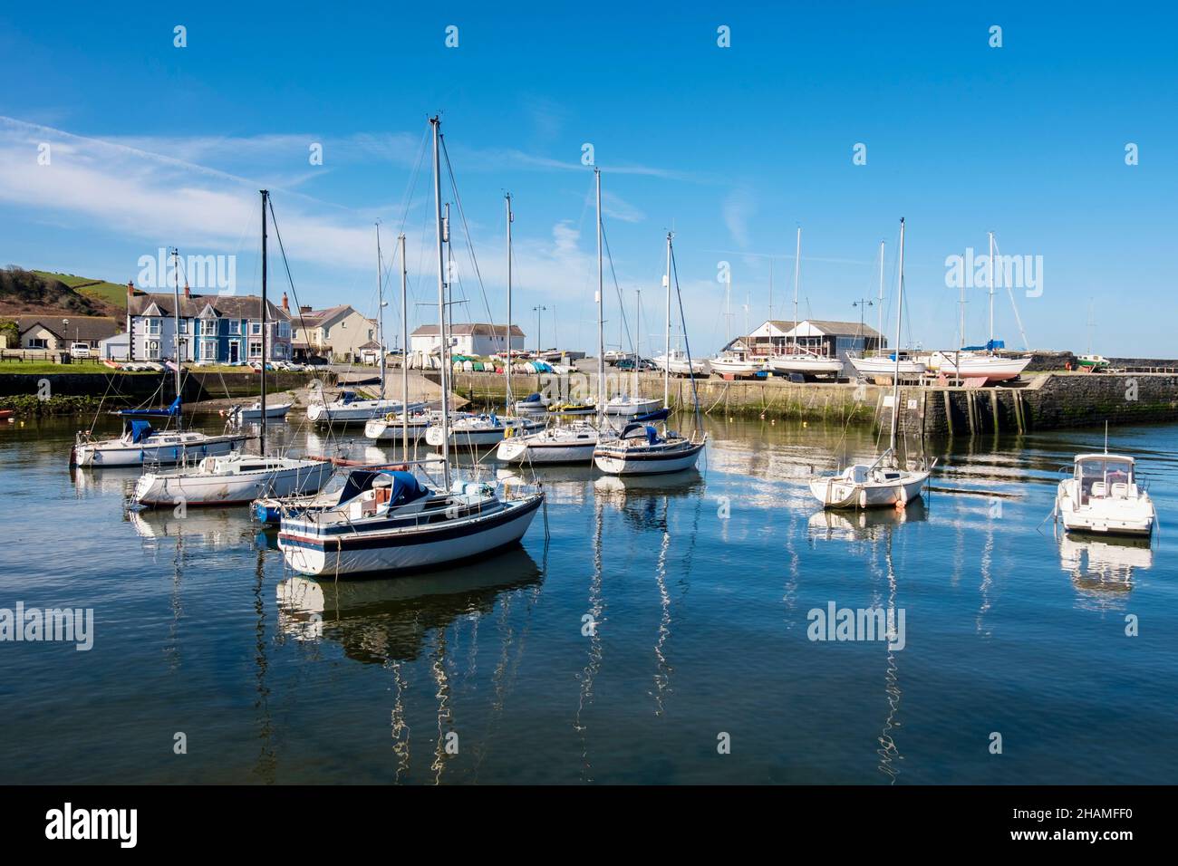 Afon Aeron River estuary with boats moored in harbour at high tide in ...
