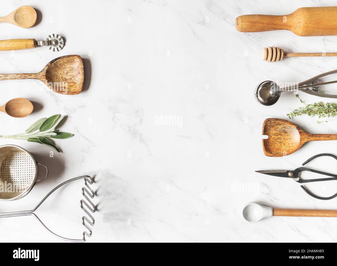 Flat lay various kitchen tools, fresh herbs and copy space for text ...