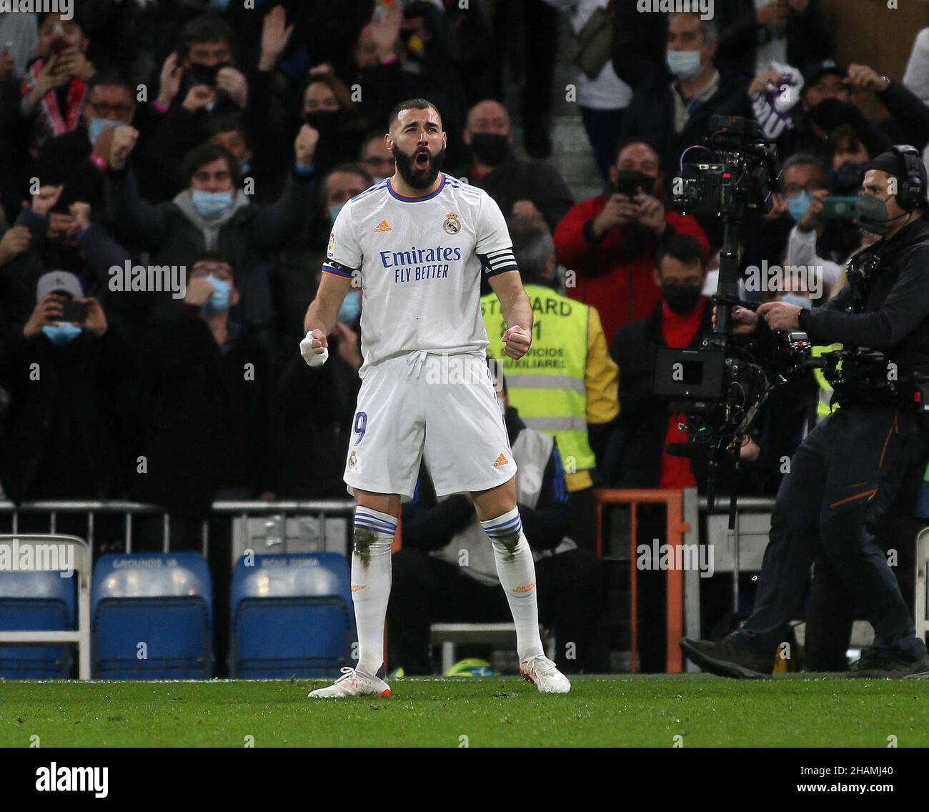 Karim Benzema of Real Madrid has just scored the leasing 1-0 goal ...