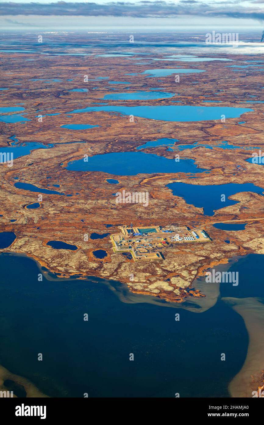 Aerial view of the tundra in autumn. Oilfield in marsh terrain under ...