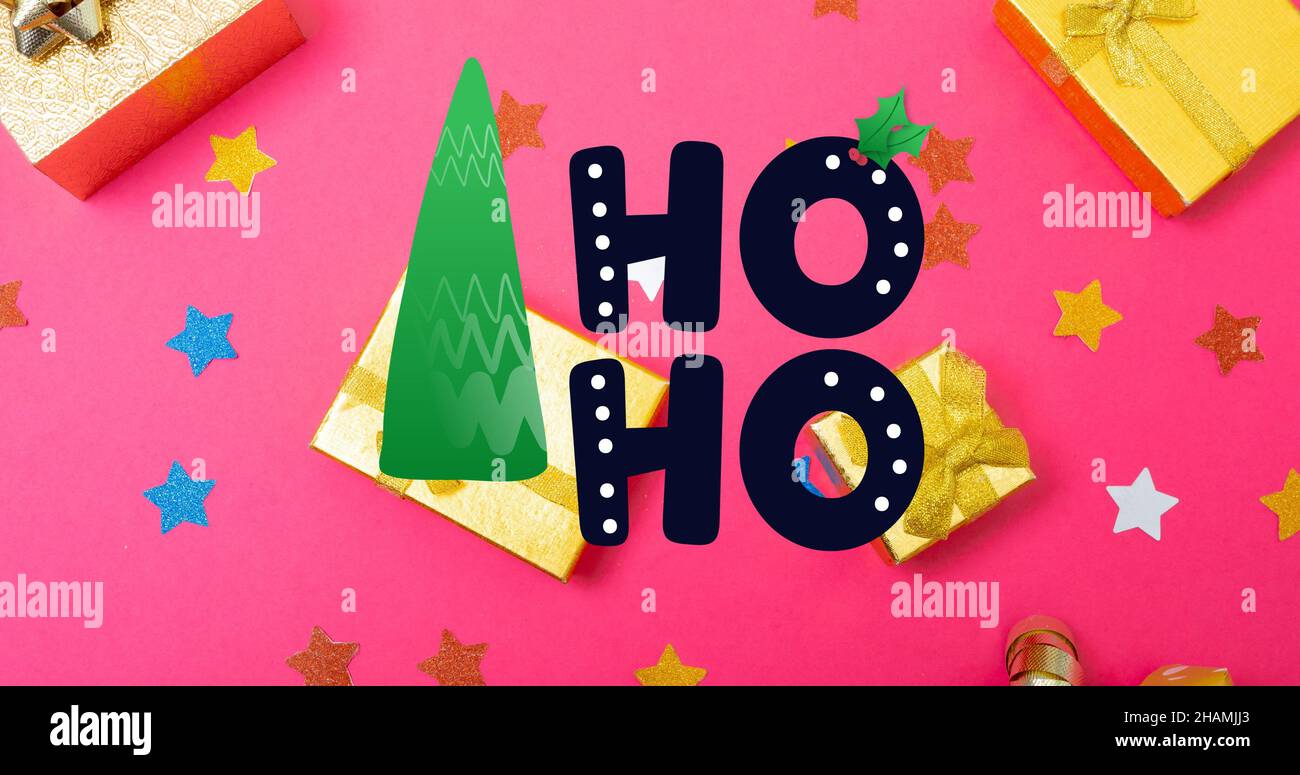 Digital composite image of hoho text and pine tree over presents amidst ...
