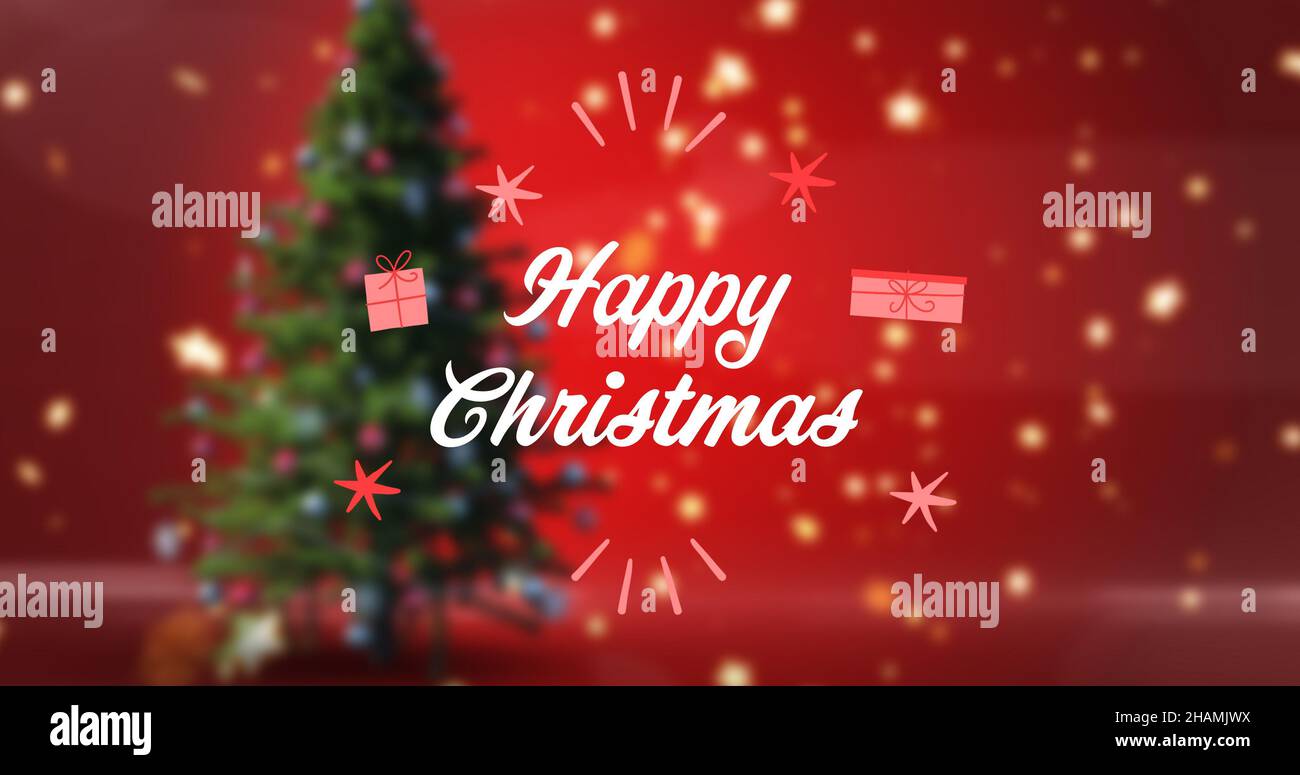 Digital composite image of happy christmas text against decorated ...