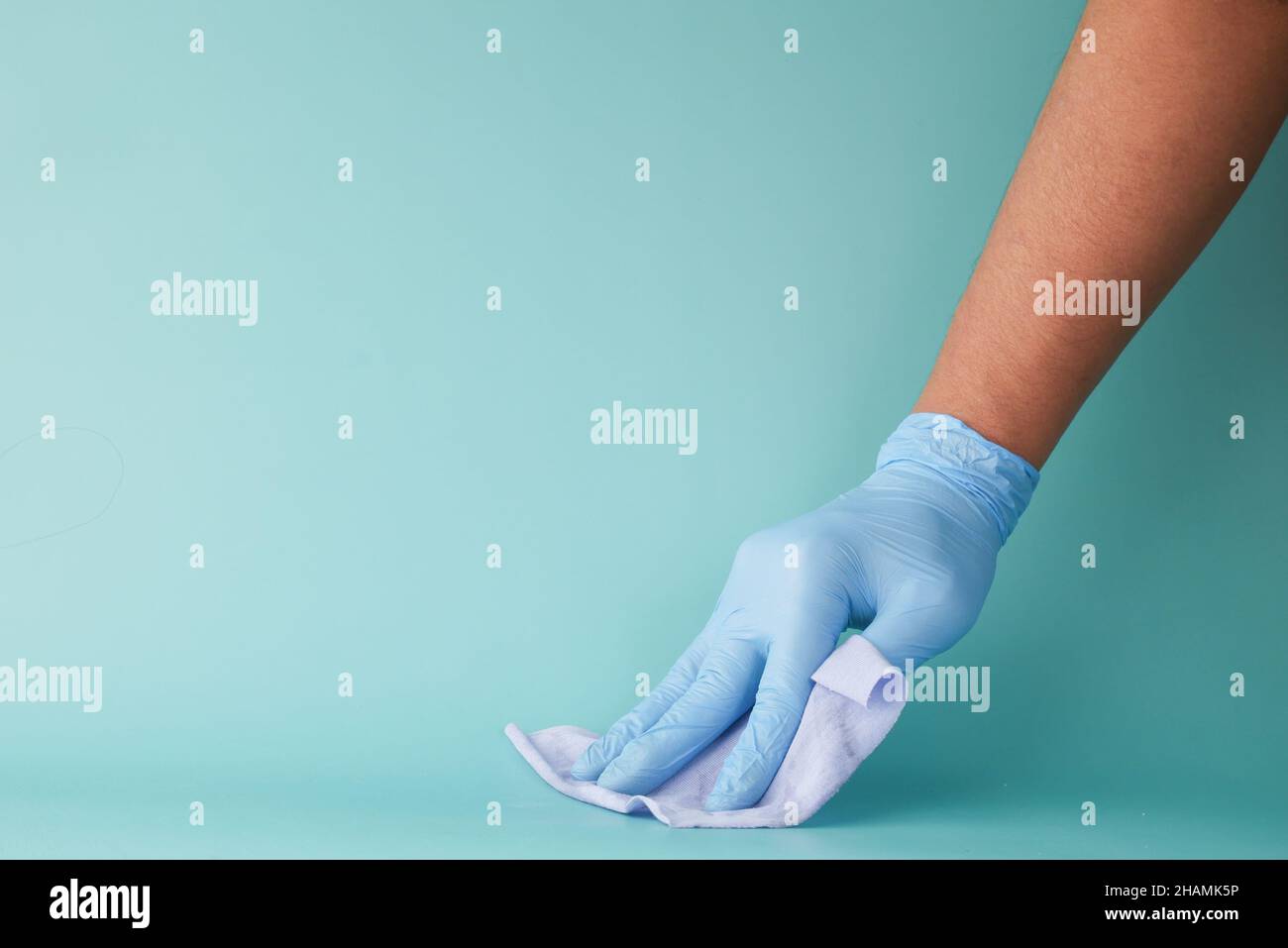 close up of person hand cleaning table with cloth Stock Photo - Alamy