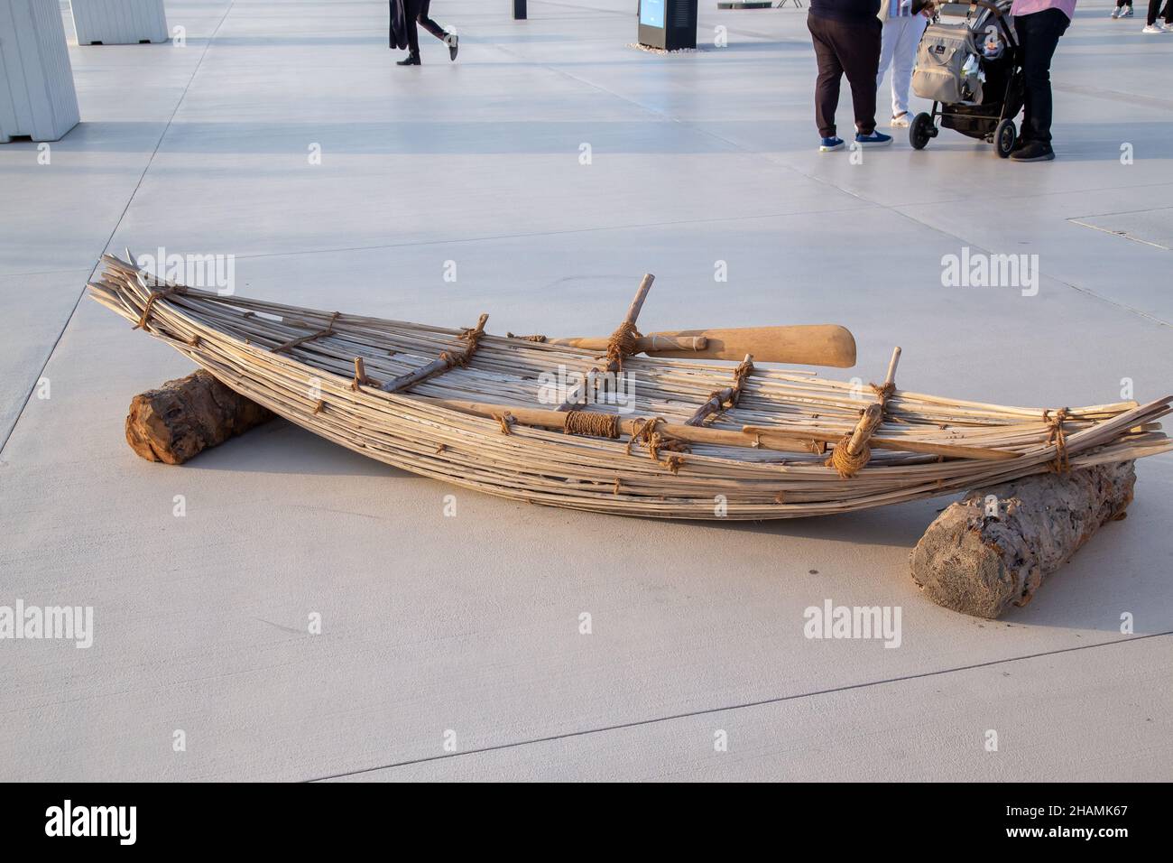 Old wooden fishing boat on display Stock Photo - Alamy
