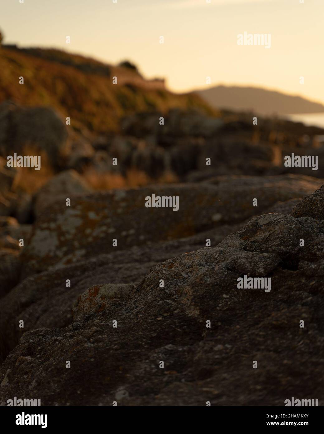 Beautiful scene of a landscape rocky green mountains with rocks against ...