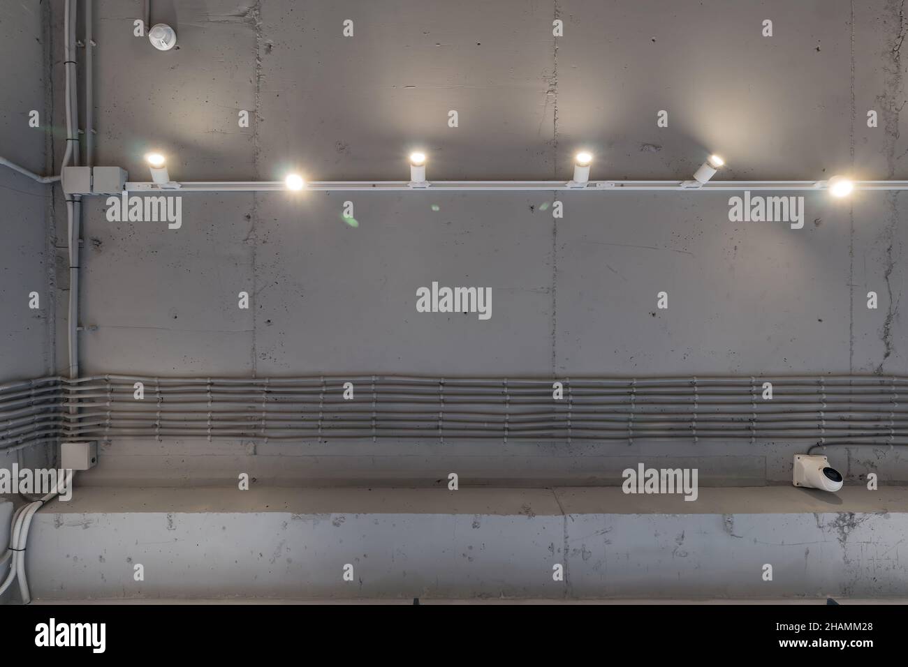 Abstract loft interior of concrete grey ceiling with air ventilation ...