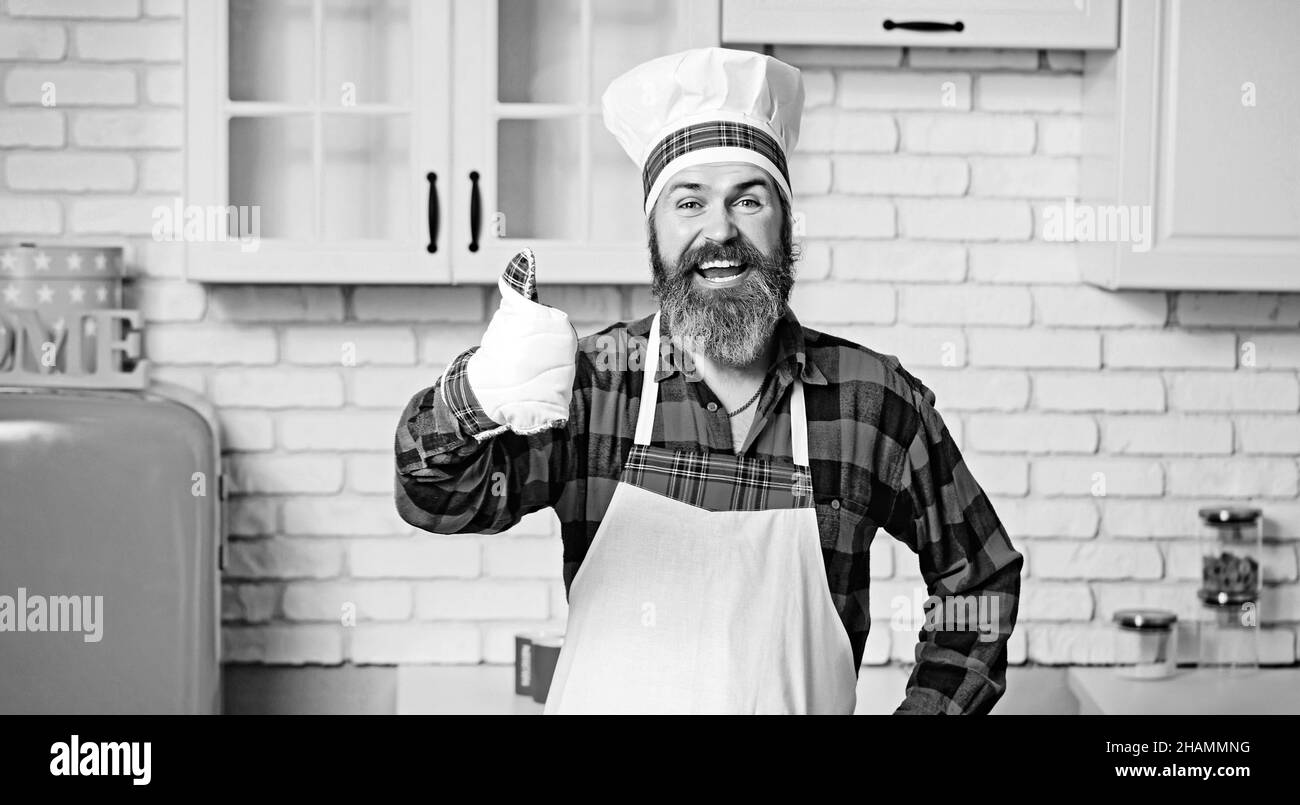 Male chef in uniform. Cook with taste approval gesture Stock Photo - Alamy