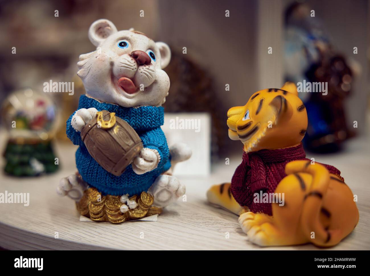 White lion cub piggy bank hi-res stock photography and images - Alamy