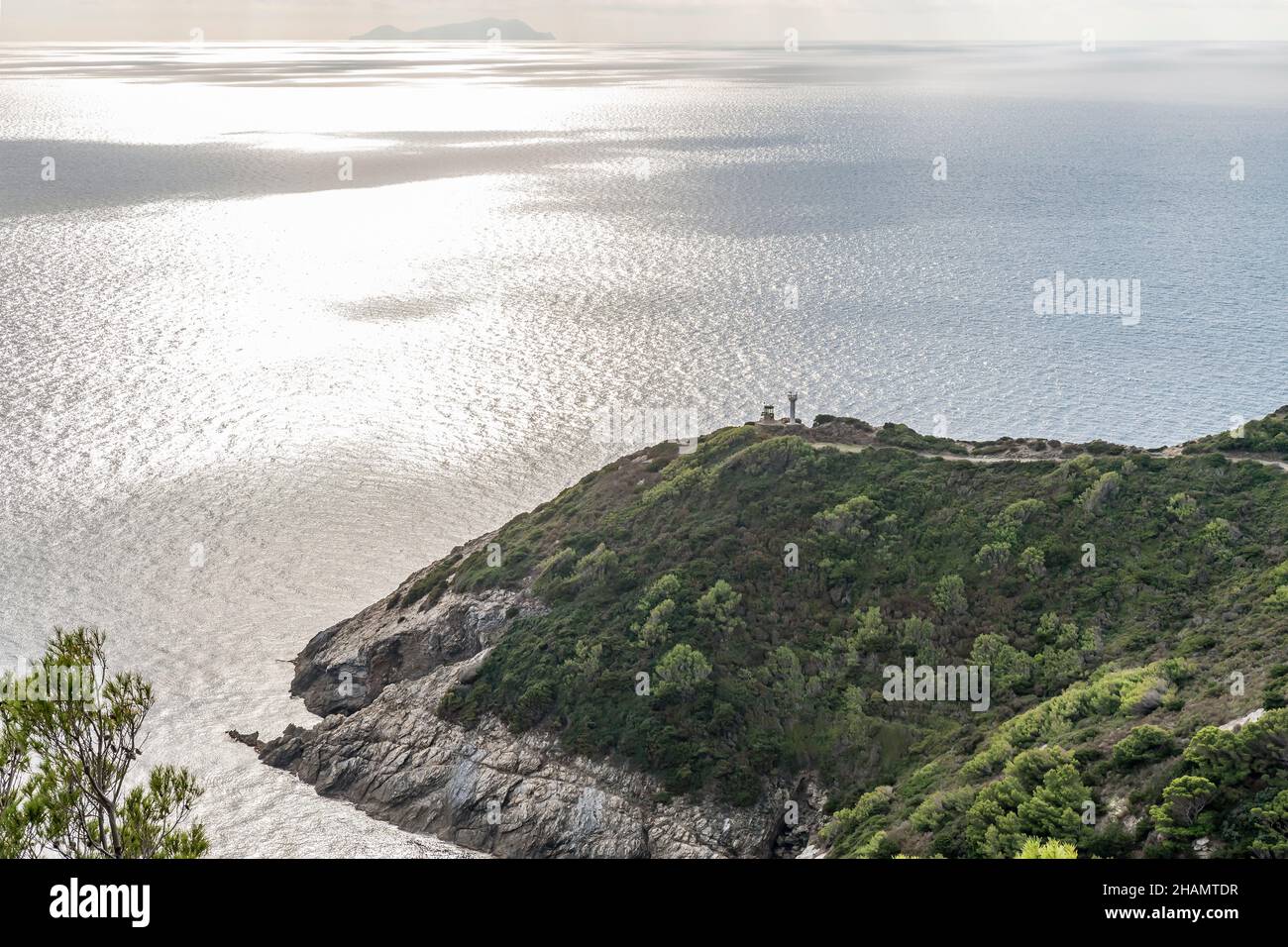 Watchtower on the island of Gorgona with the island of Capraia in the ...
