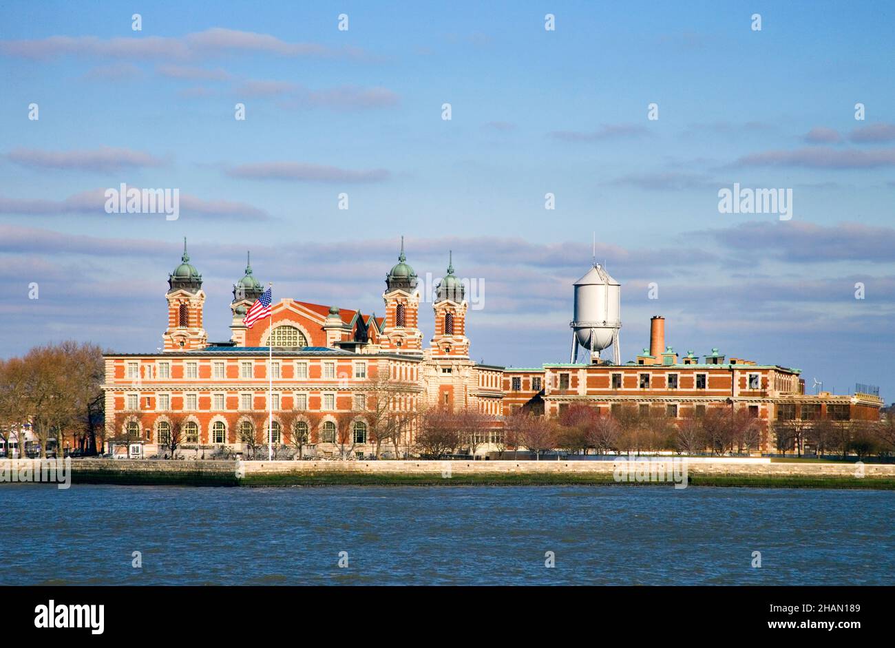 the ornate outline of buildings on ellis island where immigrants were ...