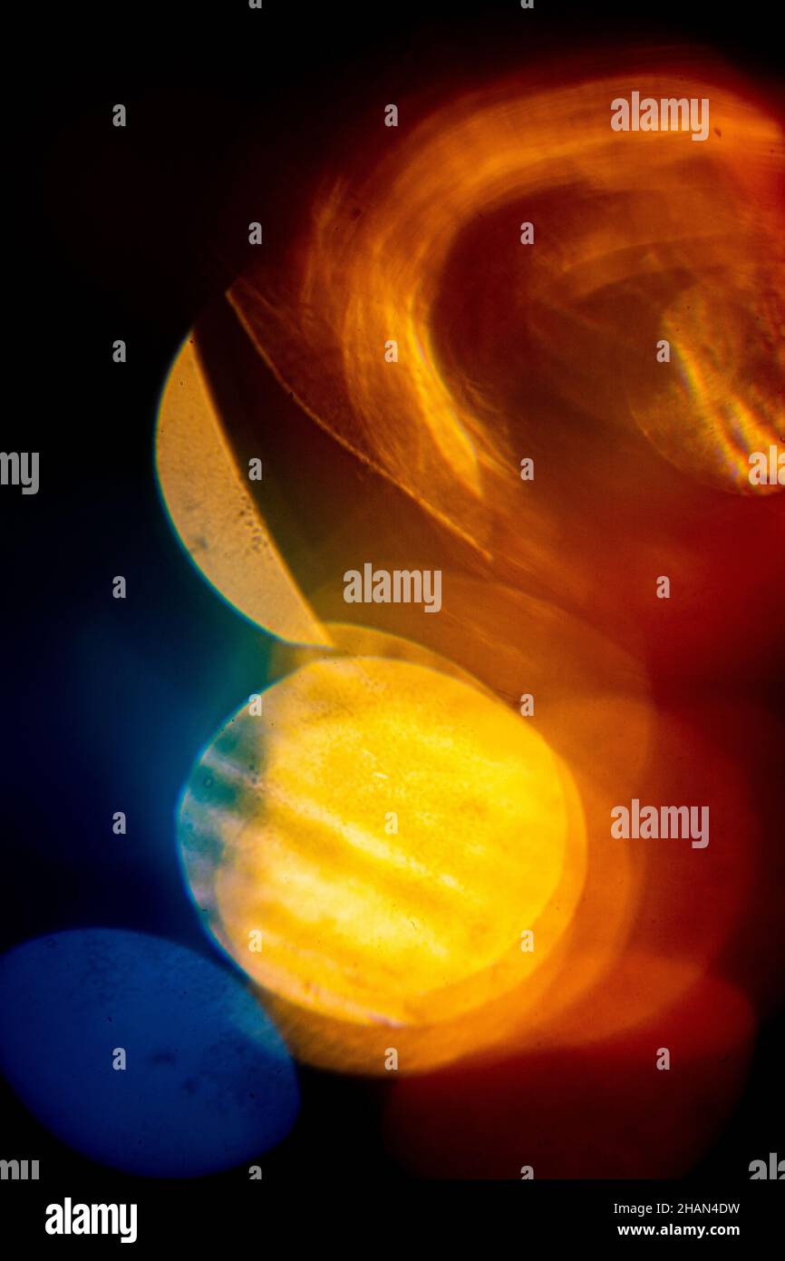 Abstract optical colorful bokeh background with colorful layer blending ...