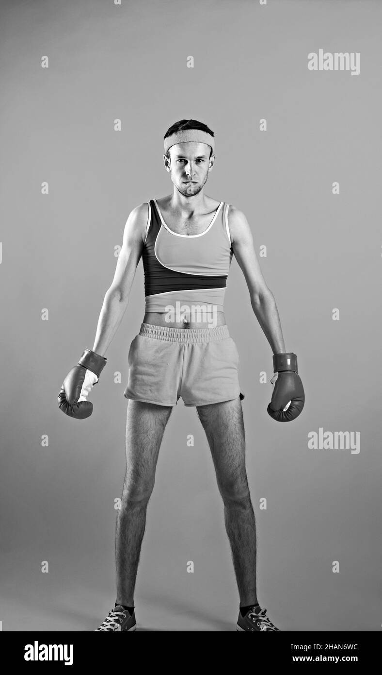 Comic weak fighter with red sport boxing gloves Stock Photo - Alamy
