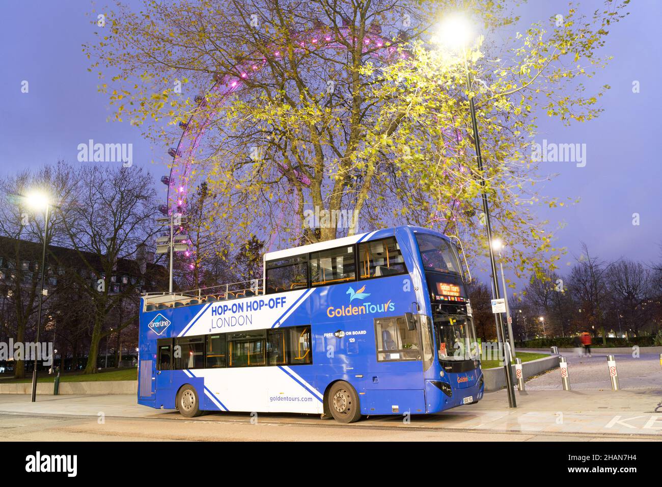 Gray Line golden tours bus parks at London south Bank with London eye ...