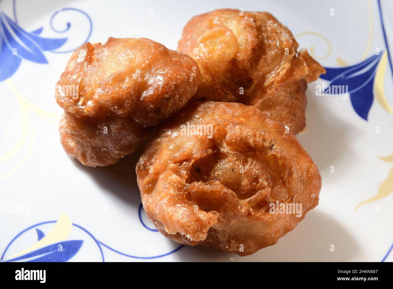 Malpua or Pua. Pancake served as a dessert or a snack originating from ...