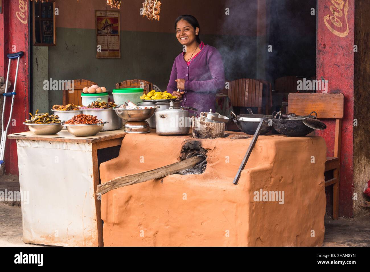 Cooking on mud stove hi-res stock photography and images - Alamy