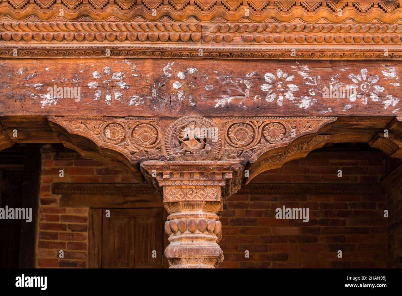Weathered wooden carvings and paintings decorate woodwork in the ...