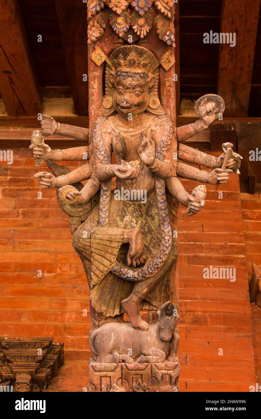 Wooden carving of a deity on the roof trusses in the Mul Chowk of the ...