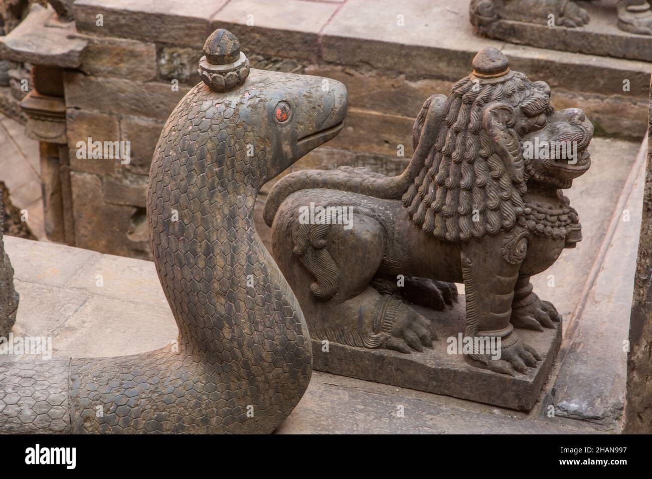 A Naga and lions guard the Tusha Hiti, or Royal Bath in the Sundari ...