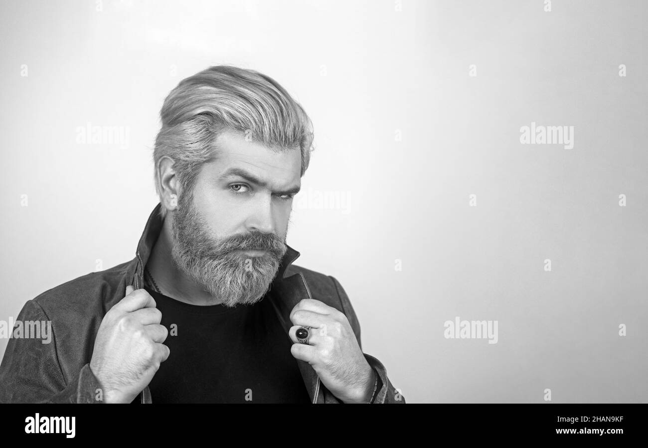 Fashion handsome man, serious male model portrait wear leather jacket ...