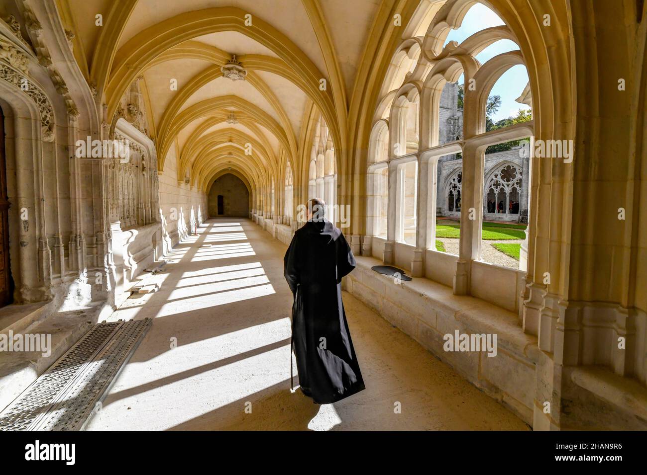 Benedictine monk in the cloister of the Abbey of Saint-Wandrille ...