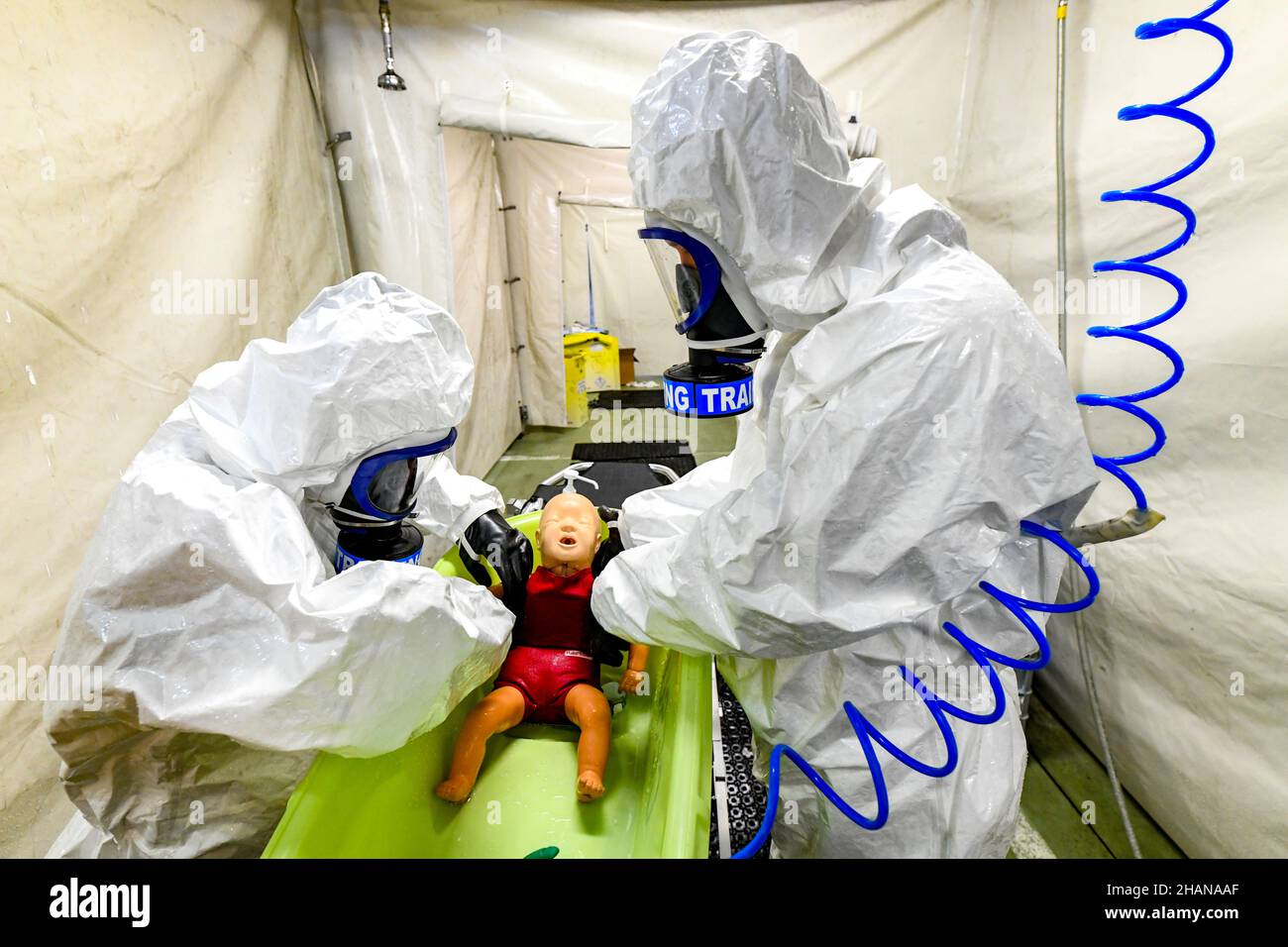 Staff during a nuclear decontamination exercise at the university ...