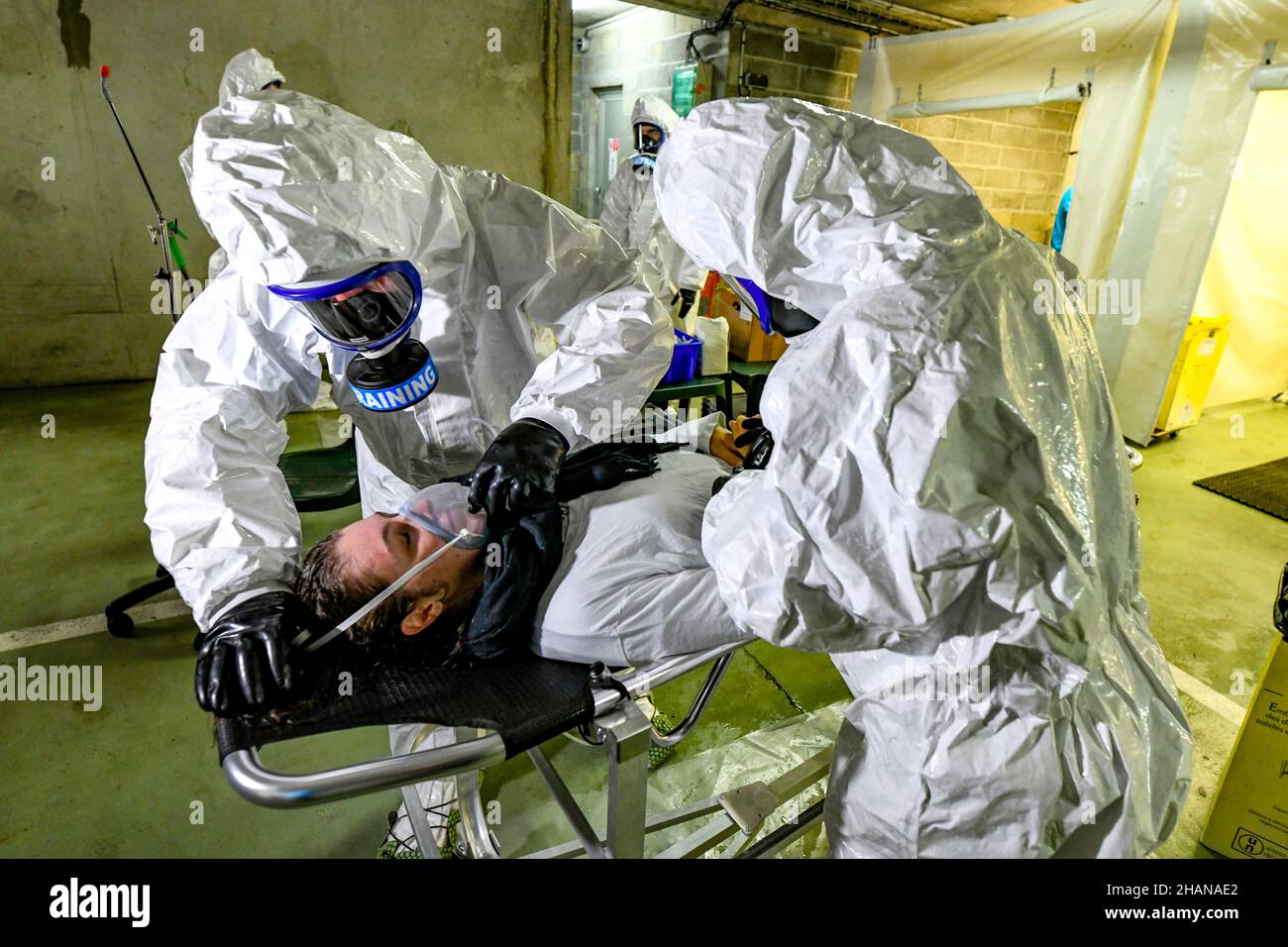 Staff during a nuclear decontamination exercise at the university ...
