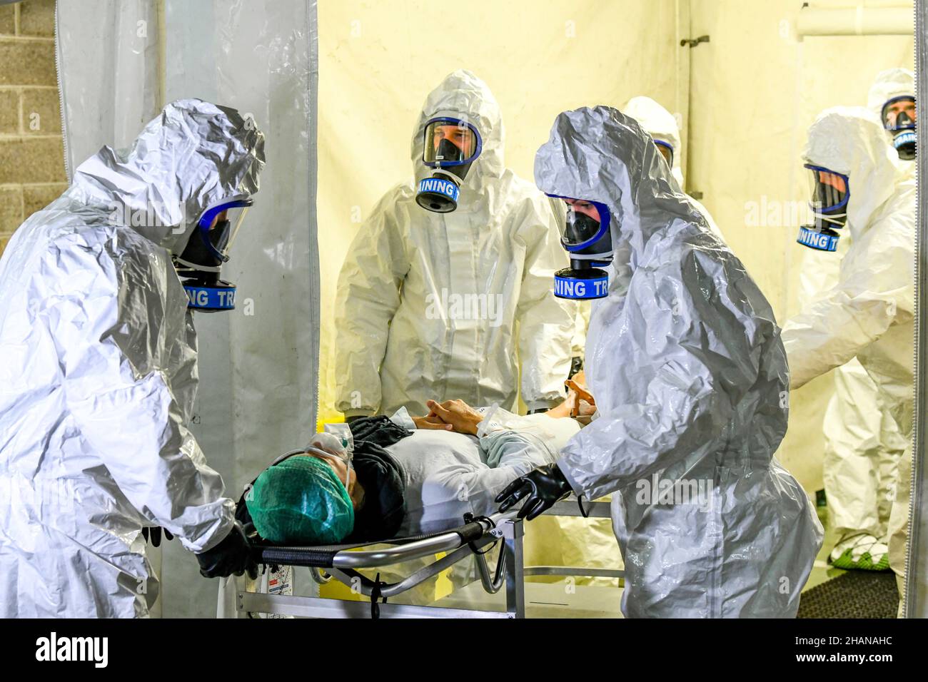 Staff during a nuclear decontamination exercise at the university ...
