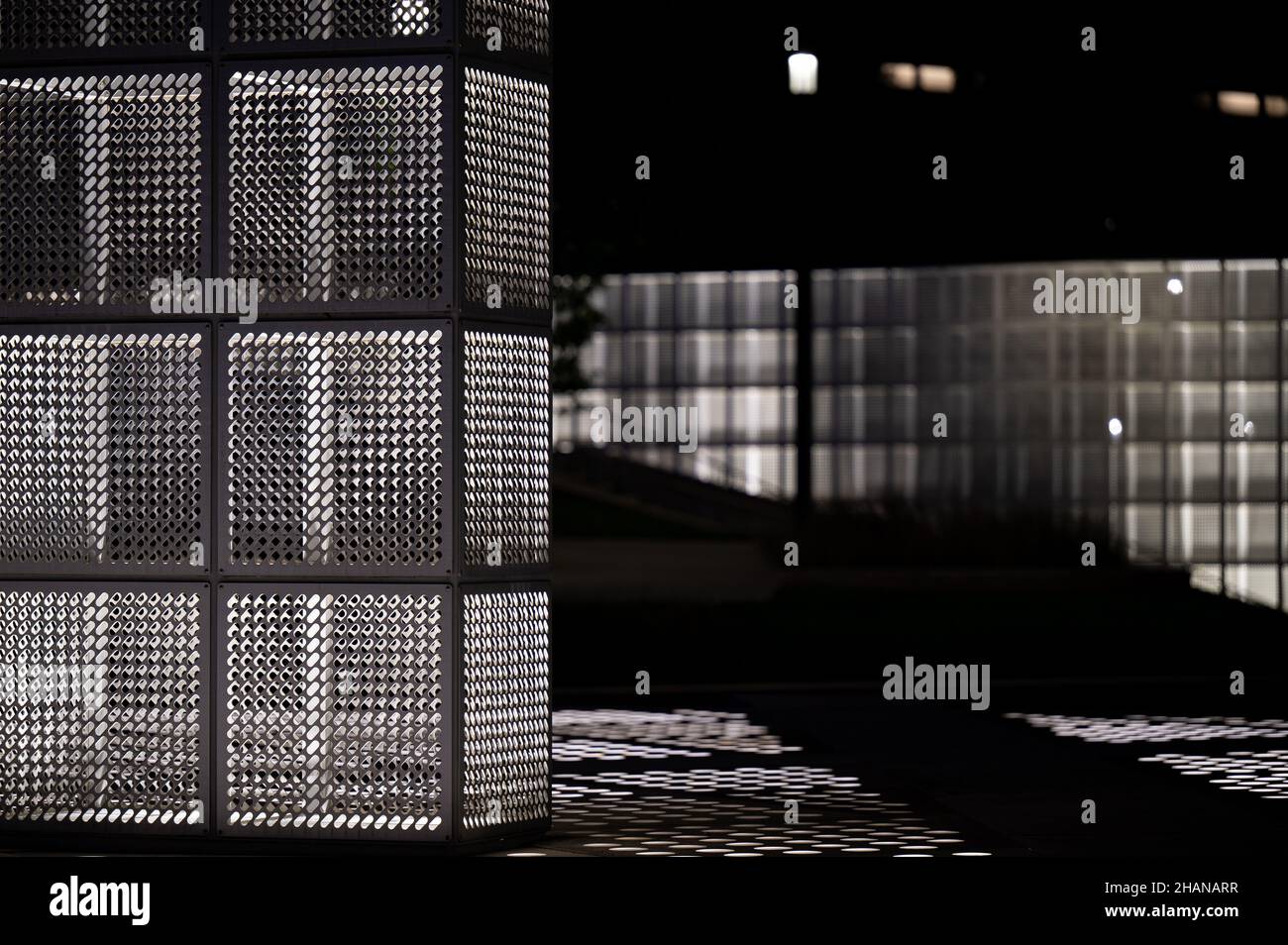 Geometric cube and dots at night with white and blue lights Stock Photo ...