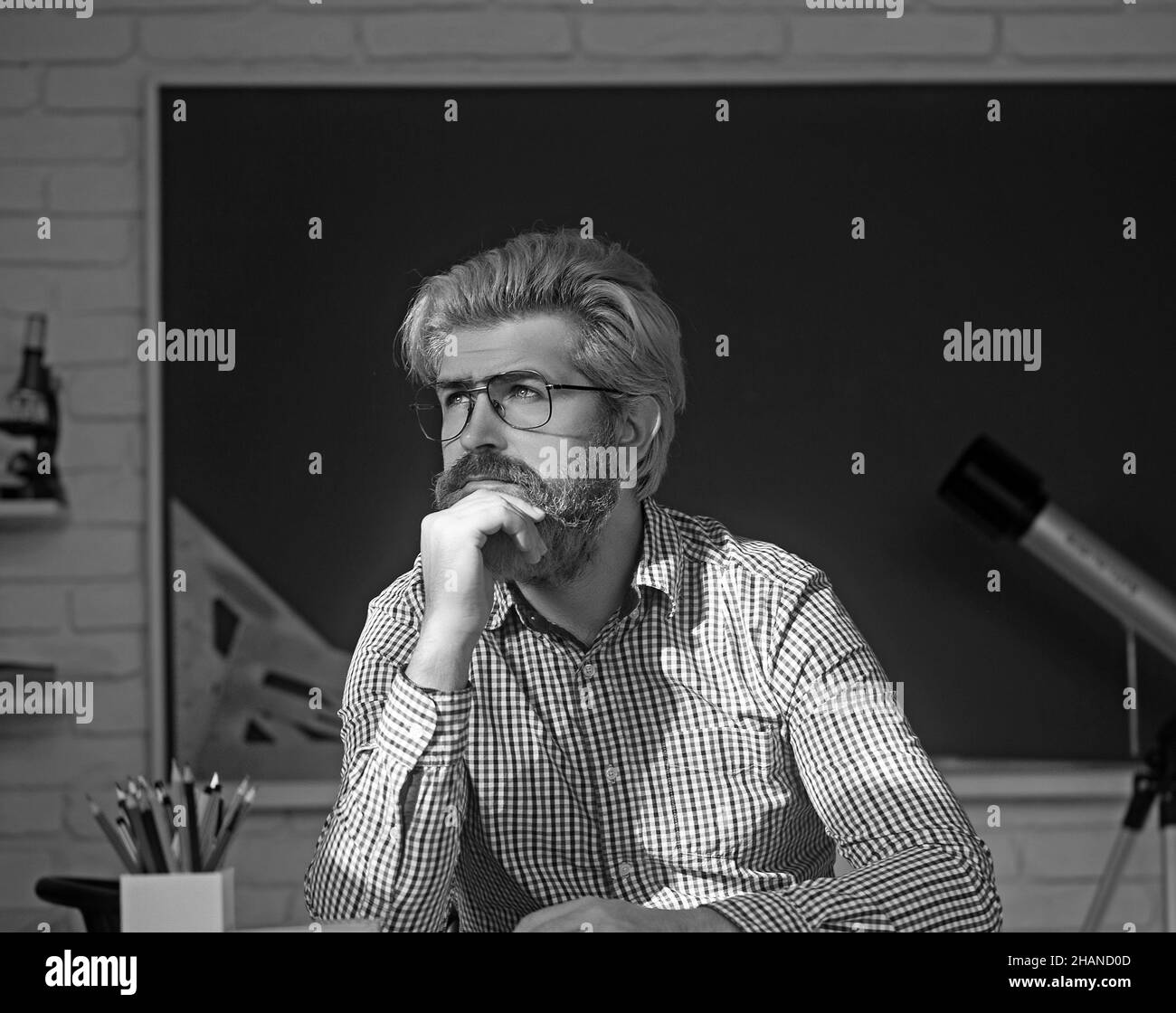 Grey hair professor thinking and looking in window Stock Photo - Alamy