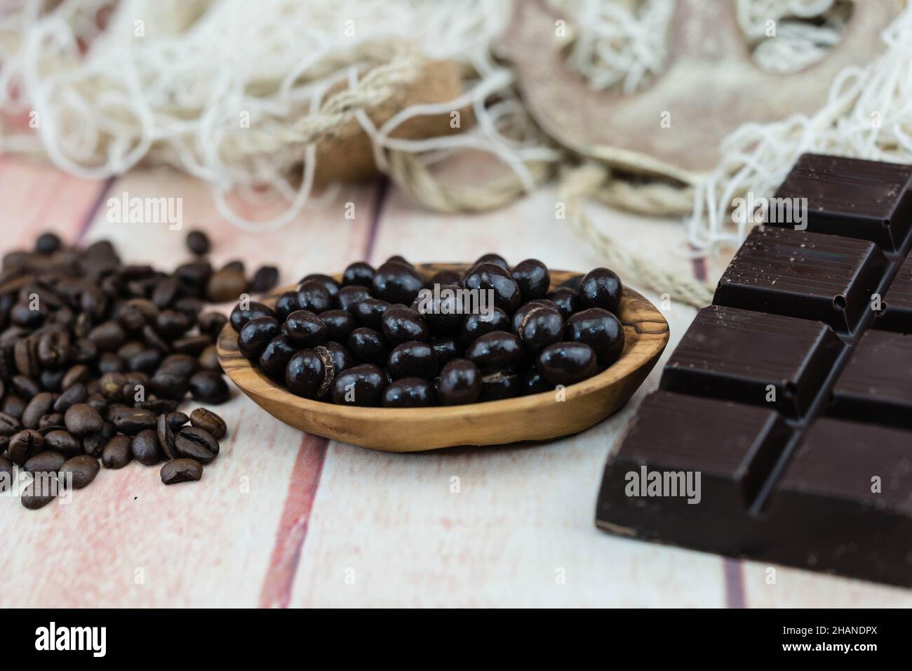 Roasted coffee beans coated with chocolate Stock Photo - Alamy