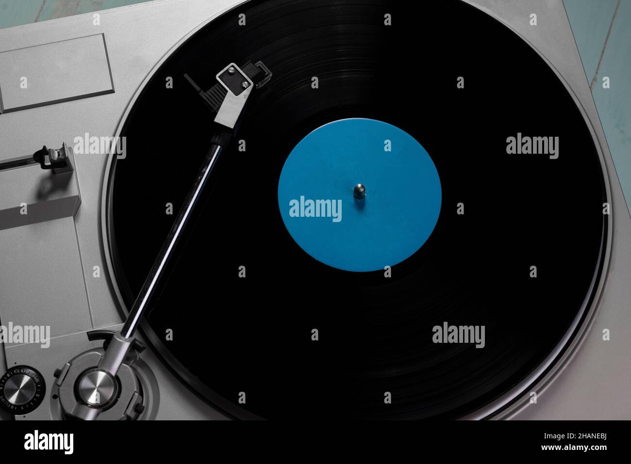 Gramophone with a vinyl record close up, top view ,photo desaturate and ...