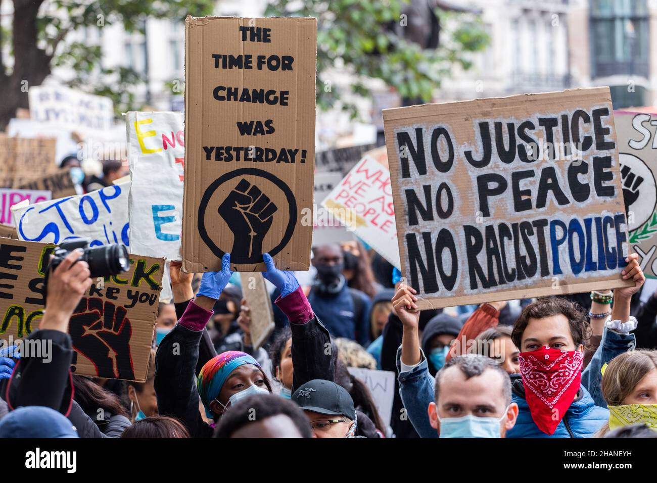 Black Lives Matter placards in a crowd of protestors at BLM protest in ...