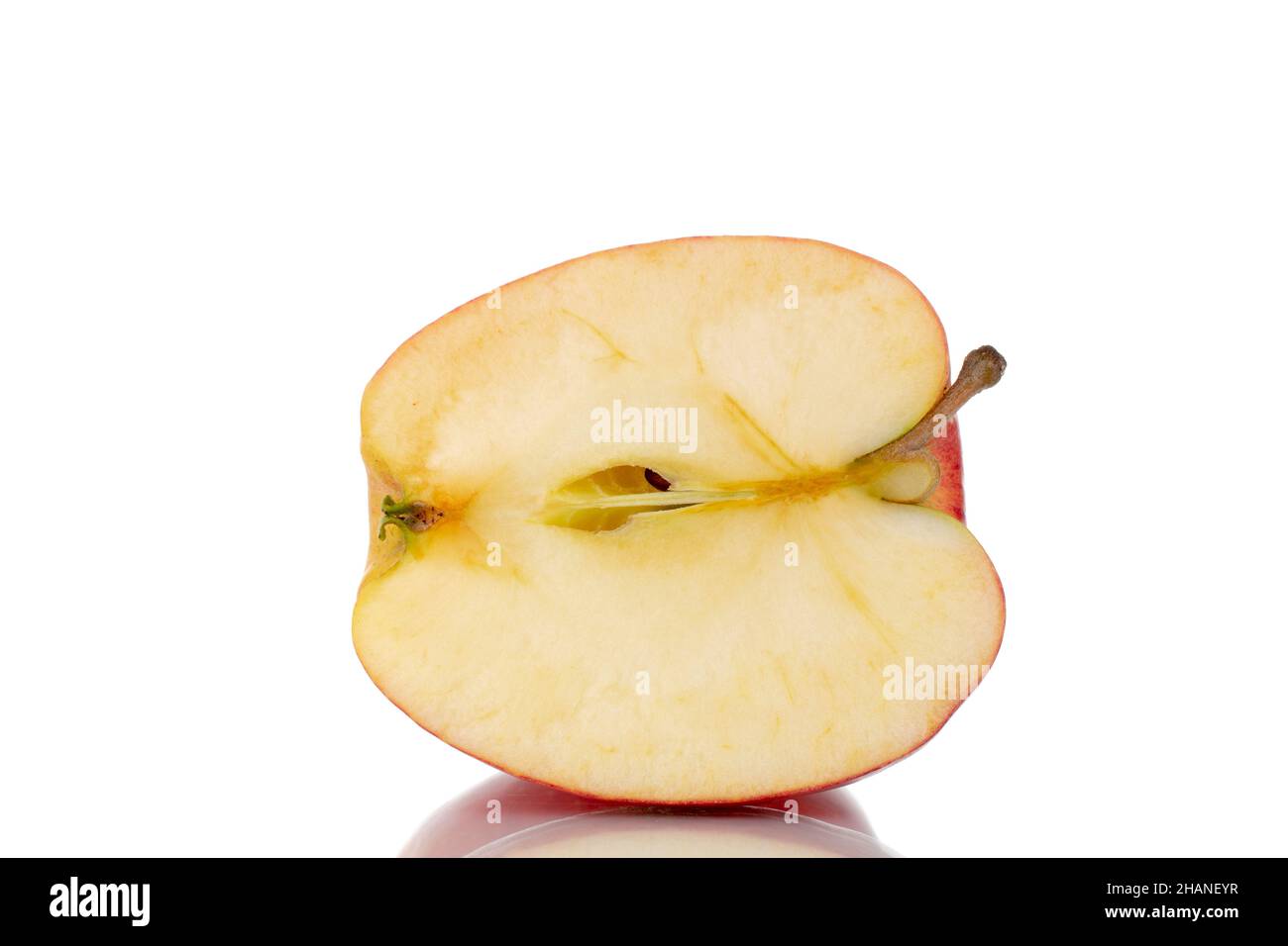 One half of an organic red apple, close-up, isolated on white Stock ...