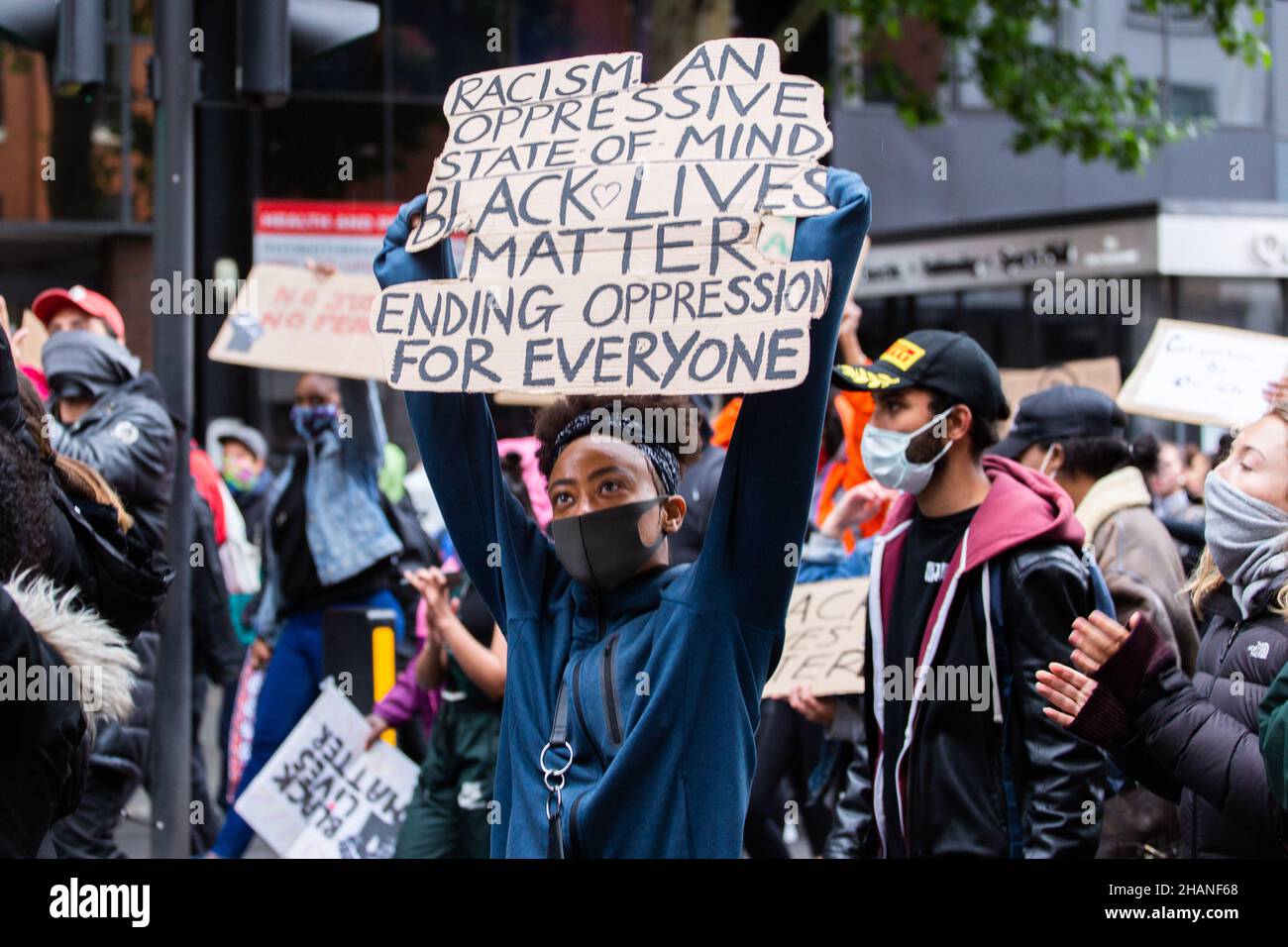 Protest activist holding placards hi-res stock photography and images ...