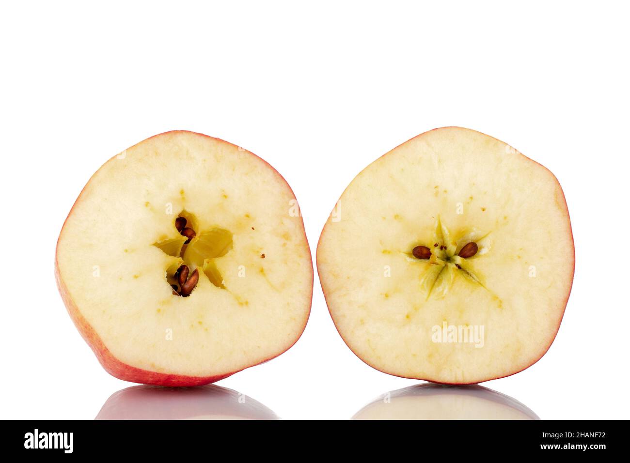 Two halves of an organic red apple, close-up, isolated on white Stock ...