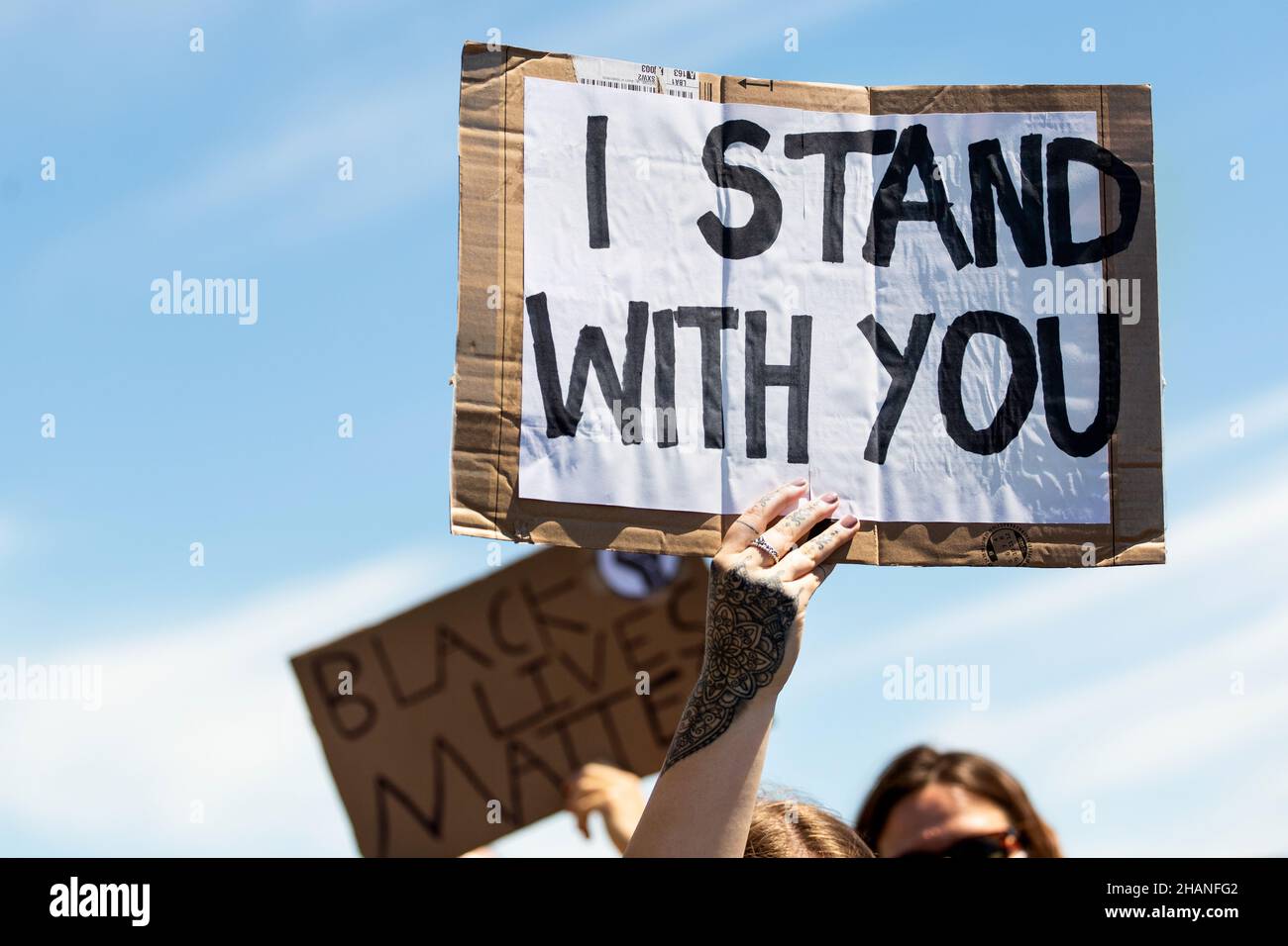 Black Lives Matter Protestor holding I stand with you placard Brighton ...