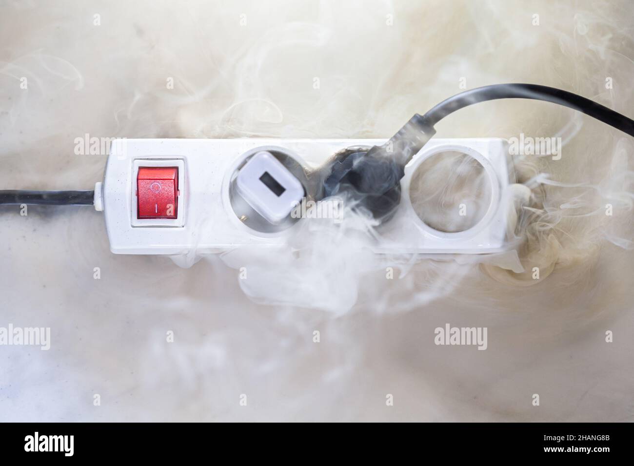 Failure caused by burning of the wire cable and socket outlet plug in ...